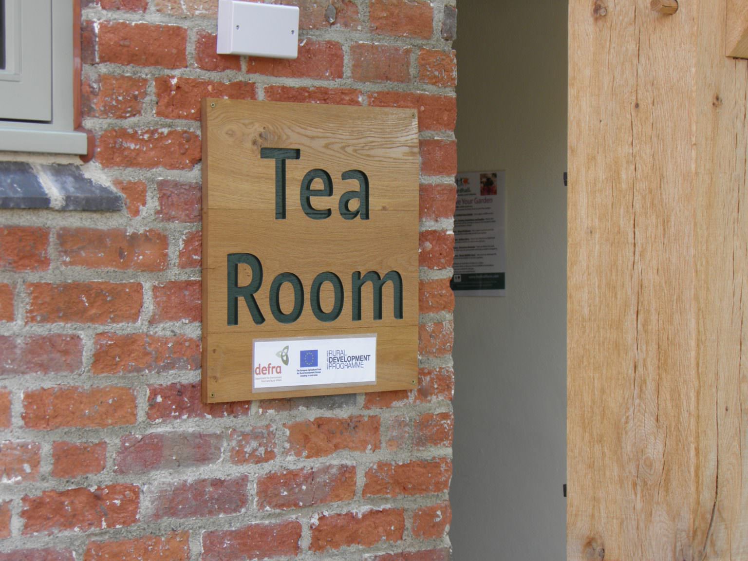 Timber & wooden signs with sandblasted and routed graphics